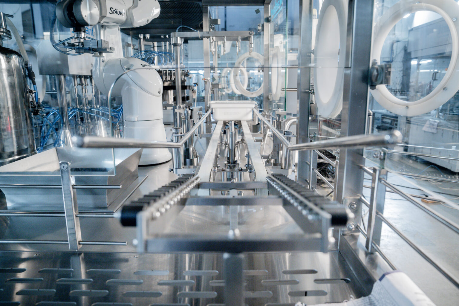 Robotic PFS Filling And Closing Machine - Radiant Industries